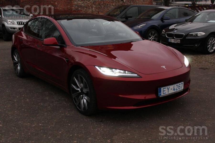 Red Tesla Model 3 2024 in Liepaja, with an engine capacity of 0.00 L and mileage of 20 thousand km for 33500 €, photo 1 on AUTOMOTO.COM.LV