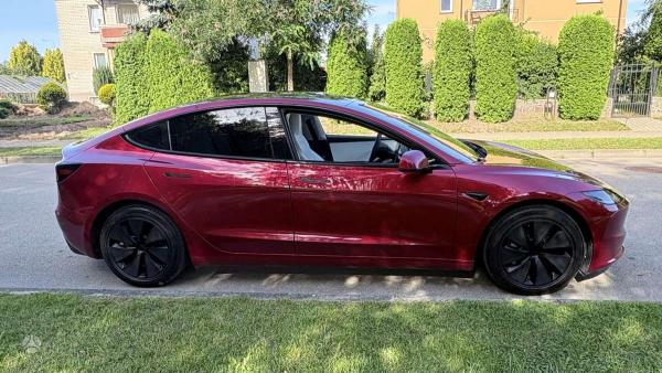 Red Tesla Model 3 2024 in Silute, with an engine capacity of 0.00 L and mileage of 47 thousand km for 35500 €, photo 3 on AUTOMOTO.COM.LV