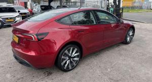 Red Tesla Model 3 2024 in Kaunas, with an engine capacity of 0.00 L and mileage of 50 thousand km for 31339 €, photo 4 on AUTOMOTO.COM.LV