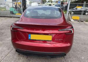 Red Tesla Model 3 2024 in Kaunas, with an engine capacity of 0.00 L and mileage of 50 thousand km for 31339 €, photo 5 on AUTOMOTO.COM.LV