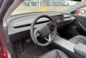Red Tesla Model 3 2024 in Kaunas, with an engine capacity of 0.00 L and mileage of 50 thousand km for 31339 €, photo 11 on AUTOMOTO.COM.LV