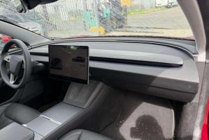 Red Tesla Model 3 2024 in Kaunas, with an engine capacity of 0.00 L and mileage of 50 thousand km for 31339 €, photo 12 on AUTOMOTO.COM.LV