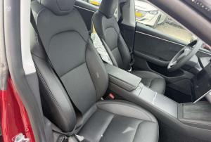 Red Tesla Model 3 2024 in Kaunas, with an engine capacity of 0.00 L and mileage of 50 thousand km for 31339 €, photo 13 on AUTOMOTO.COM.LV