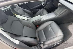 Red Tesla Model 3 2024 in Kaunas, with an engine capacity of 0.00 L and mileage of 50 thousand km for 31339 €, photo 14 on AUTOMOTO.COM.LV