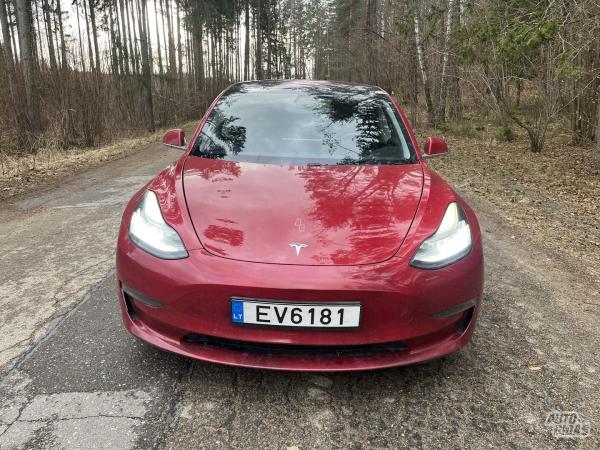 Red Tesla Model 3 2017 in Vilnius, with an engine capacity of 0.00 L and mileage of 68 thousand km for 17400 €, photo 1 on AUTOMOTO.COM.LV