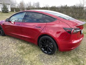 Red Tesla Model 3 2019 in Vilnius, with an engine capacity of 0.00 L and mileage of 168 thousand km for 20000 €, photo 4 on AUTOMOTO.COM.LV