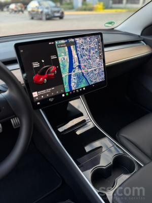 Red Tesla Model 3 2019 in Jelgava, with an engine capacity of 0.00 L and mileage of 93 thousand km for 26000 €, photo 15 on AUTOMOTO.COM.LV