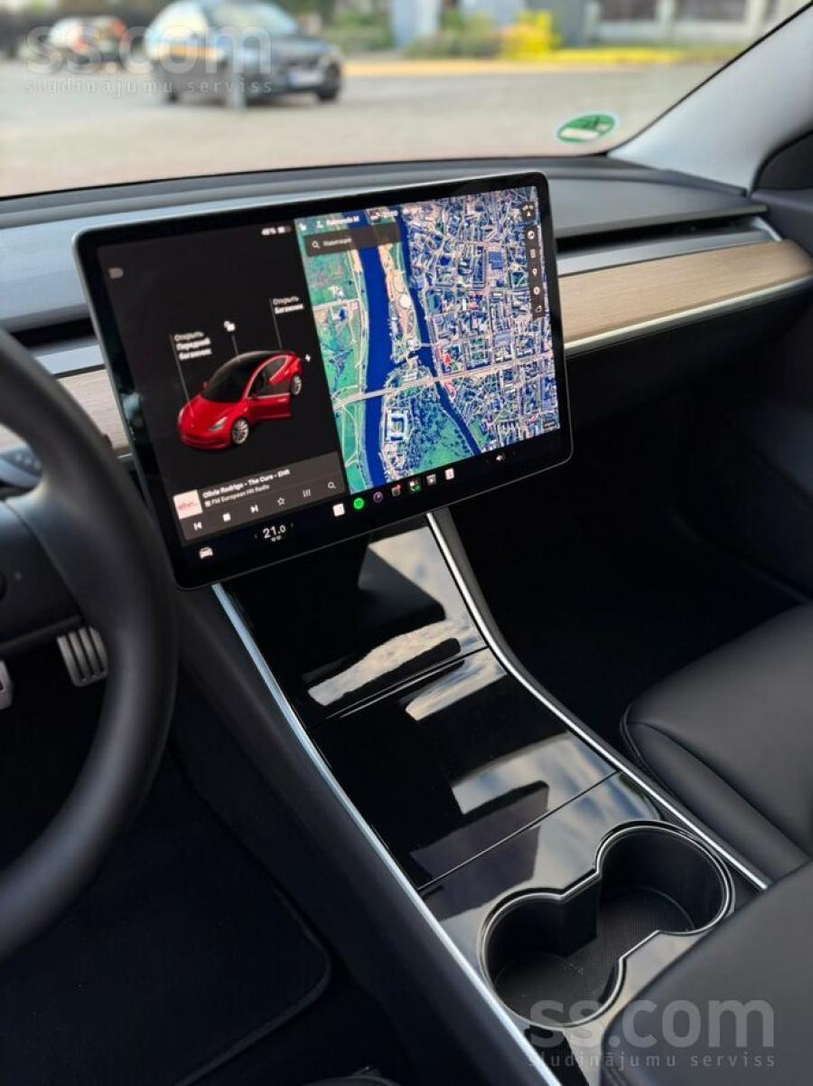 Red Tesla Model 3 2019 in Jelgava, with an engine capacity of 0.00 L and mileage of 93 thousand km for 26000 €, photo 15 on AUTOMOTO.COM.LV