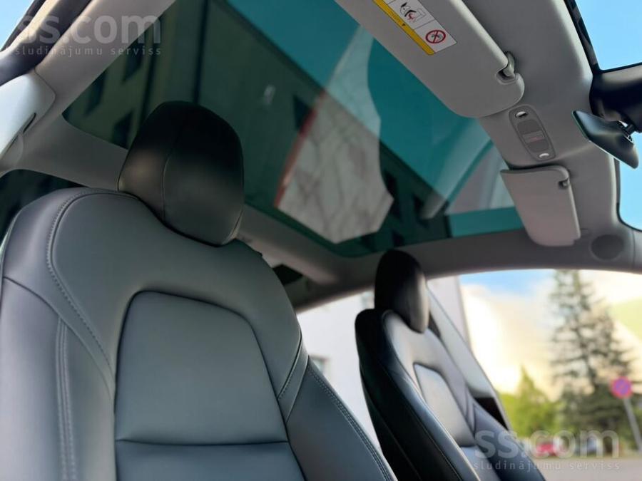 Red Tesla Model 3 2019 in Jelgava, with an engine capacity of 0.00 L and mileage of 93 thousand km for 26000 €, photo 26 on AUTOMOTO.COM.LV