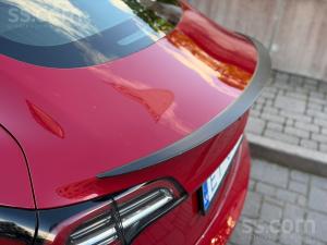 Red Tesla Model 3 2019 in Jelgava, with an engine capacity of 0.00 L and mileage of 93 thousand km for 26000 €, photo 30 on AUTOMOTO.COM.LV