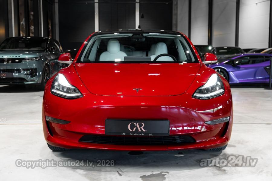 Red Tesla Model 3 2019 in Riga, with an engine capacity of 0.00 L and mileage of 140 thousand km for 23900 €, photo 3 on AUTOMOTO.COM.LV