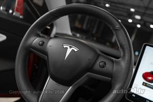 Red Tesla Model 3 2019 in Riga, with an engine capacity of 0.00 L and mileage of 140 thousand km for 23900 €, photo 19 on AUTOMOTO.COM.LV