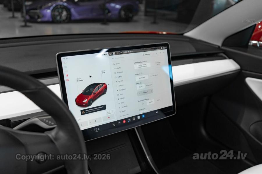 Red Tesla Model 3 2019 in Riga, with an engine capacity of 0.00 L and mileage of 140 thousand km for 23900 €, photo 20 on AUTOMOTO.COM.LV