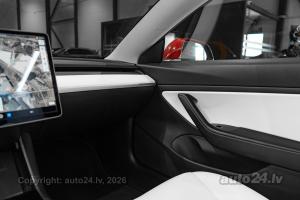 Red Tesla Model 3 2019 in Riga, with an engine capacity of 0.00 L and mileage of 140 thousand km for 23900 €, photo 27 on AUTOMOTO.COM.LV