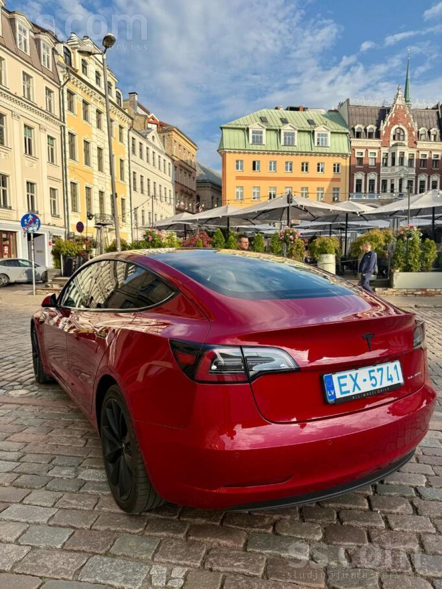 Red Tesla Model 3 2019 in Riga, with an engine capacity of 0.00 L and mileage of 116 thousand km for 20500 €, photo 5 on AUTOMOTO.COM.LV