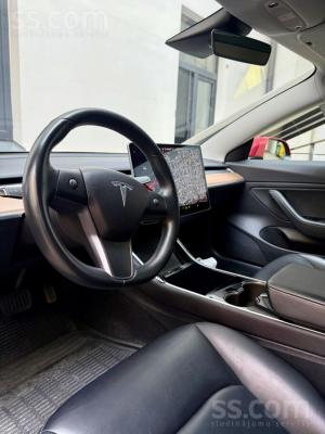 Red Tesla Model 3 2019 in Riga, with an engine capacity of 0.00 L and mileage of 116 thousand km for 20500 €, photo 6 on AUTOMOTO.COM.LV