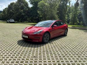 Red Tesla Model 3 2021 in Vilnius, with an engine capacity of 0.00 L and mileage of 77 thousand km for 22400 €, photo 7 on AUTOMOTO.COM.LV