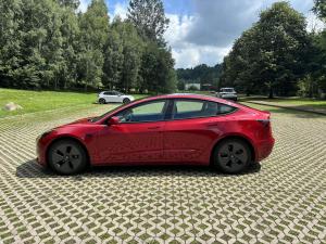 Red Tesla Model 3 2021 in Vilnius, with an engine capacity of 0.00 L and mileage of 77 thousand km for 22400 €, photo 9 on AUTOMOTO.COM.LV