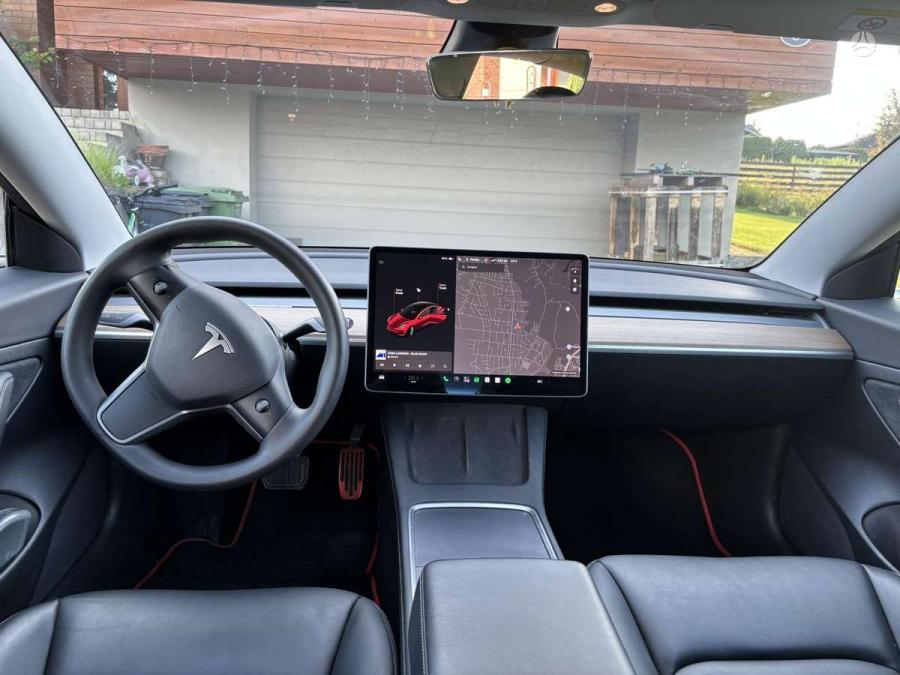 Red Tesla Model 3 2021 in Vilnius, with an engine capacity of 0.00 L and mileage of 77 thousand km for 22400 €, photo 13 on AUTOMOTO.COM.LV