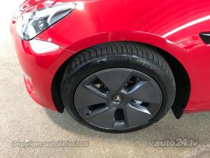 Red Tesla Model 3 2021 in Tallinn, with an engine capacity of 0.00 L and mileage of 58 thousand km for 30990 €, photo 4 on AUTOMOTO.COM.LV