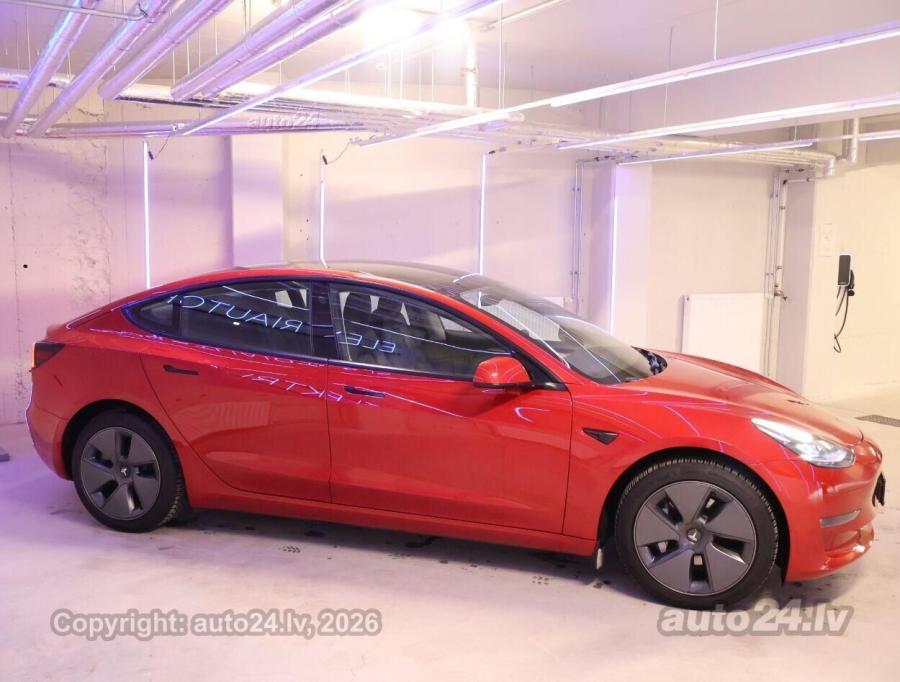 Red Tesla Model 3 2021 in Tallinn, with an engine capacity of 0.00 L and mileage of 58 thousand km for 30990 €, photo 6 on AUTOMOTO.COM.LV