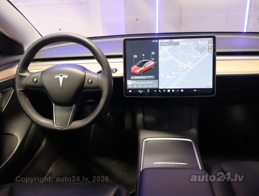 Red Tesla Model 3 2021 in Tallinn, with an engine capacity of 0.00 L and mileage of 58 thousand km for 30990 €, photo 13 on AUTOMOTO.COM.LV