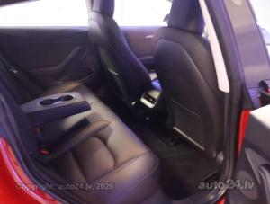 Red Tesla Model 3 2021 in Tallinn, with an engine capacity of 0.00 L and mileage of 58 thousand km for 30990 €, photo 14 on AUTOMOTO.COM.LV