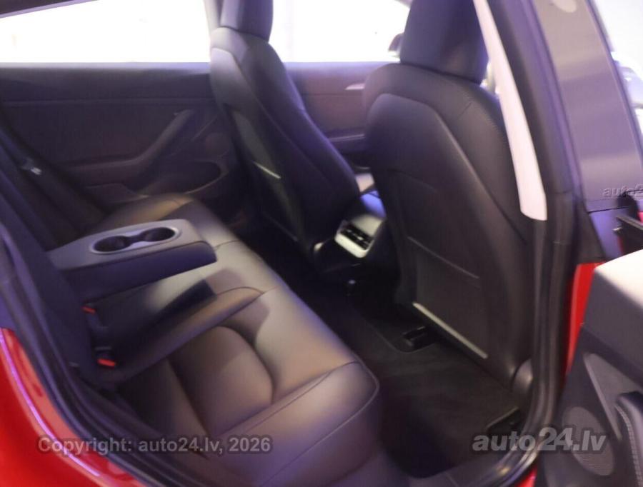 Red Tesla Model 3 2021 in Tallinn, with an engine capacity of 0.00 L and mileage of 58 thousand km for 30990 €, photo 14 on AUTOMOTO.COM.LV