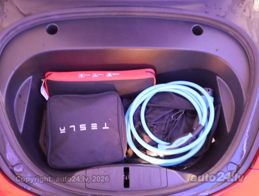 Red Tesla Model 3 2021 in Tallinn, with an engine capacity of 0.00 L and mileage of 58 thousand km for 30990 €, photo 19 on AUTOMOTO.COM.LV