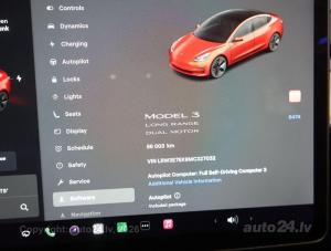 Red Tesla Model 3 2021 in Tallinn, with an engine capacity of 0.00 L and mileage of 58 thousand km for 30990 €, photo 21 on AUTOMOTO.COM.LV