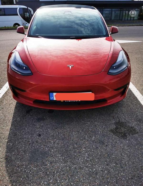 Red Tesla Model 3 2021 in Vilnius, with an engine capacity of 0.00 L and mileage of 80 thousand km for 20300 €, photo 1 on AUTOMOTO.COM.LV
