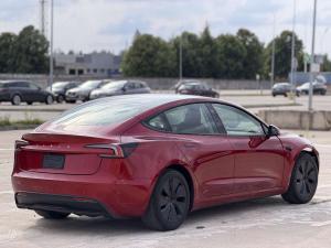 Red Tesla Model 3 2024 in Siauliai, with an engine capacity of 0.00 L and mileage of 33 thousand km for 18400 €, photo 7 on AUTOMOTO.COM.LV