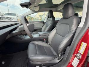 Red Tesla Model 3 2024 in Siauliai, with an engine capacity of 0.00 L and mileage of 33 thousand km for 18400 €, photo 9 on AUTOMOTO.COM.LV