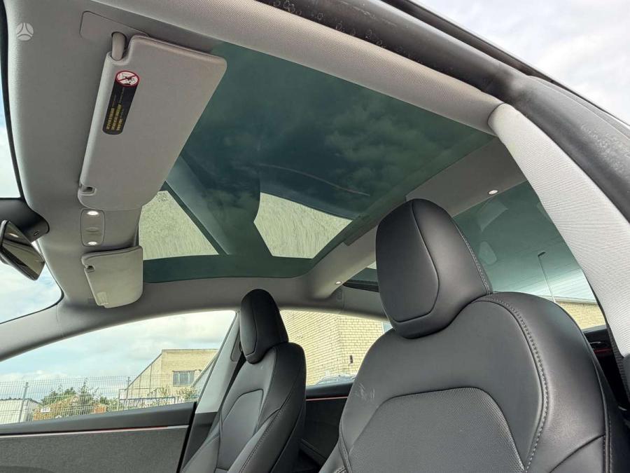 Red Tesla Model 3 2024 in Siauliai, with an engine capacity of 0.00 L and mileage of 33 thousand km for 18400 €, photo 10 on AUTOMOTO.COM.LV