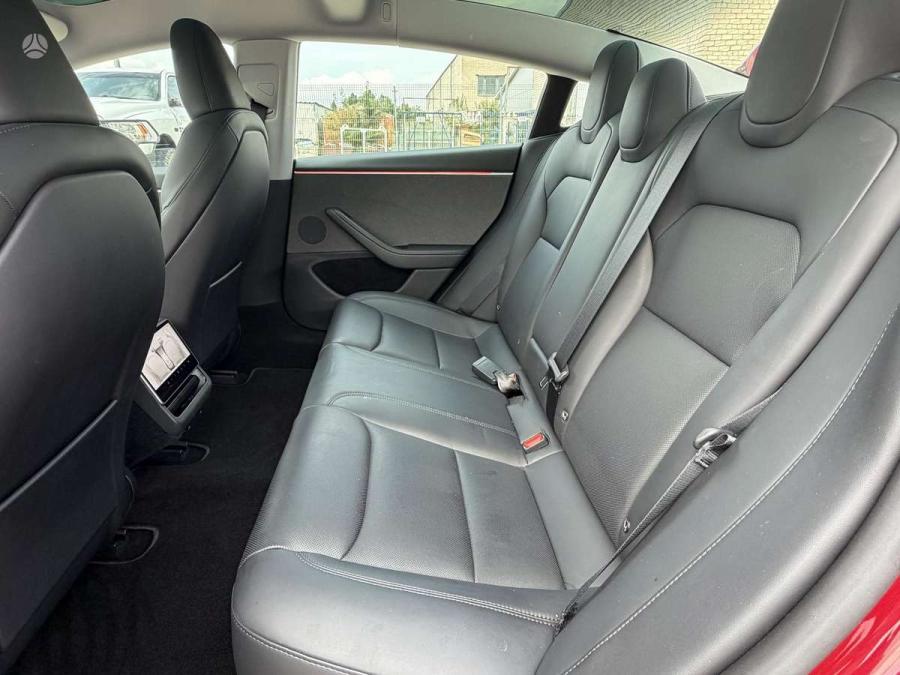 Red Tesla Model 3 2024 in Siauliai, with an engine capacity of 0.00 L and mileage of 33 thousand km for 18400 €, photo 14 on AUTOMOTO.COM.LV