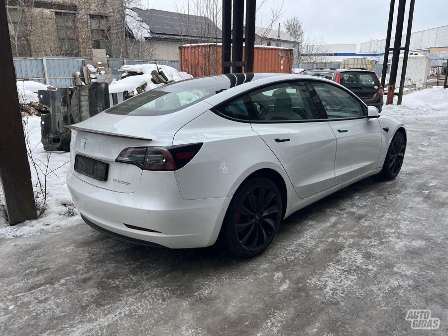 Tesla Model 3 2021 in Vilnius, with an engine capacity of 0.00 L and mileage of 138 thousand km for 24000 €, photo 2 on AUTOMOTO.COM.LV