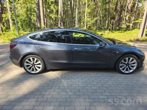 Violet Tesla Model 3 2020 in Riga, with an engine capacity of 0.00 L and mileage of 223 thousand km for 16100 €, photo 4 on AUTOMOTO.COM.LV