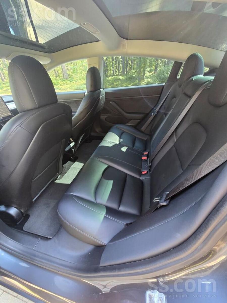 Violet Tesla Model 3 2020 in Riga, with an engine capacity of 0.00 L and mileage of 223 thousand km for 16100 €, photo 11 on AUTOMOTO.COM.LV