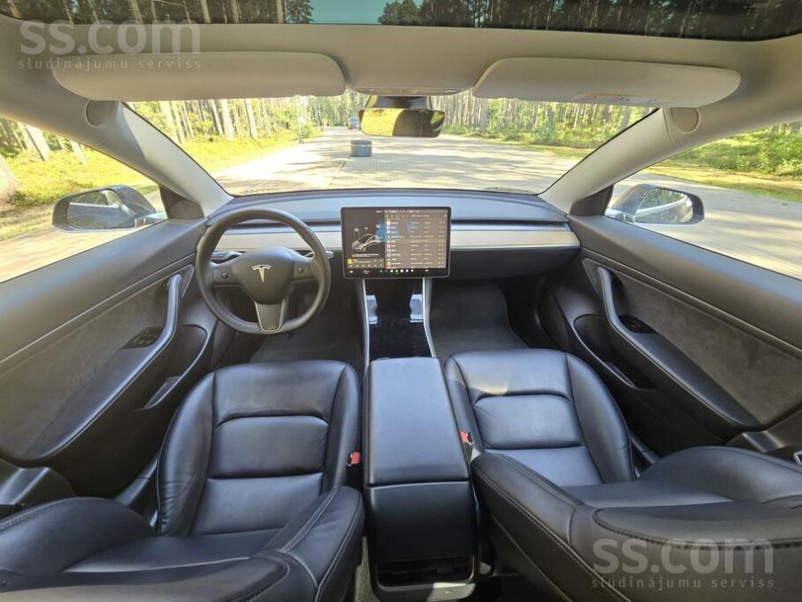 Violet Tesla Model 3 2020 in Riga, with an engine capacity of 0.00 L and mileage of 223 thousand km for 16100 €, photo 12 on AUTOMOTO.COM.LV