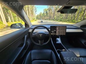 Violet Tesla Model 3 2020 in Riga, with an engine capacity of 0.00 L and mileage of 223 thousand km for 16100 €, photo 13 on AUTOMOTO.COM.LV