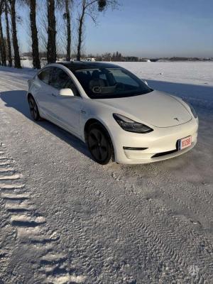 White Tesla Model 3 2019 in Kaunas, with an engine capacity of 0.00 L and mileage of 90 thousand km for 14800 €, photo 8 on AUTOMOTO.COM.LV