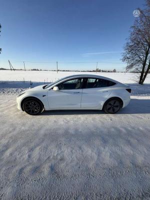 White Tesla Model 3 2019 in Kaunas, with an engine capacity of 0.00 L and mileage of 90 thousand km for 13600 €, photo 5 on AUTOMOTO.COM.LV