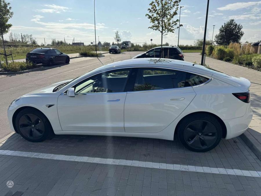White Tesla Model 3 2019 in Vilnius, with an engine capacity of 0.00 L and mileage of 94 thousand km for 20500 €, photo 12 on AUTOMOTO.COM.LV