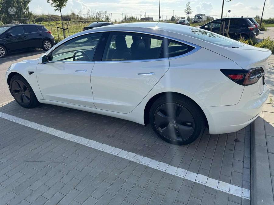 White Tesla Model 3 2019 in Vilnius, with an engine capacity of 0.00 L and mileage of 94 thousand km for 20500 €, photo 13 on AUTOMOTO.COM.LV