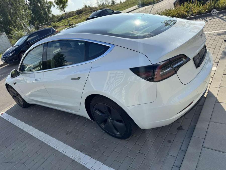 White Tesla Model 3 2019 in Vilnius, with an engine capacity of 0.00 L and mileage of 94 thousand km for 20500 €, photo 14 on AUTOMOTO.COM.LV
