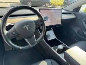 White Tesla Model 3 2019 in Vilnius, with an engine capacity of 0.00 L and mileage of 94 thousand km for 20500 €, photo 32 on AUTOMOTO.COM.LV