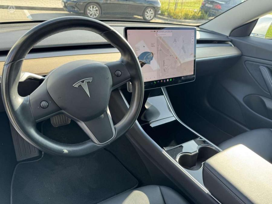 White Tesla Model 3 2019 in Vilnius, with an engine capacity of 0.00 L and mileage of 94 thousand km for 20500 €, photo 32 on AUTOMOTO.COM.LV