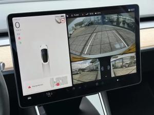 White Tesla Model 3 2020 in Riga, with an engine capacity of 0.00 L and mileage of 150 thousand km for 15505 €, photo 16 on AUTOMOTO.COM.LV