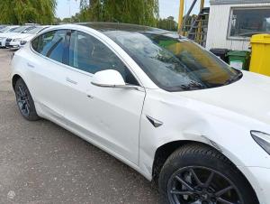 White Tesla Model 3 2020 in Marijampole, with an engine capacity of 0.00 L and mileage of 146 thousand km for 12400 €, photo 7 on AUTOMOTO.COM.LV