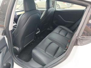 White Tesla Model 3 2020 in Marijampole, with an engine capacity of 0.00 L and mileage of 146 thousand km for 12400 €, photo 15 on AUTOMOTO.COM.LV